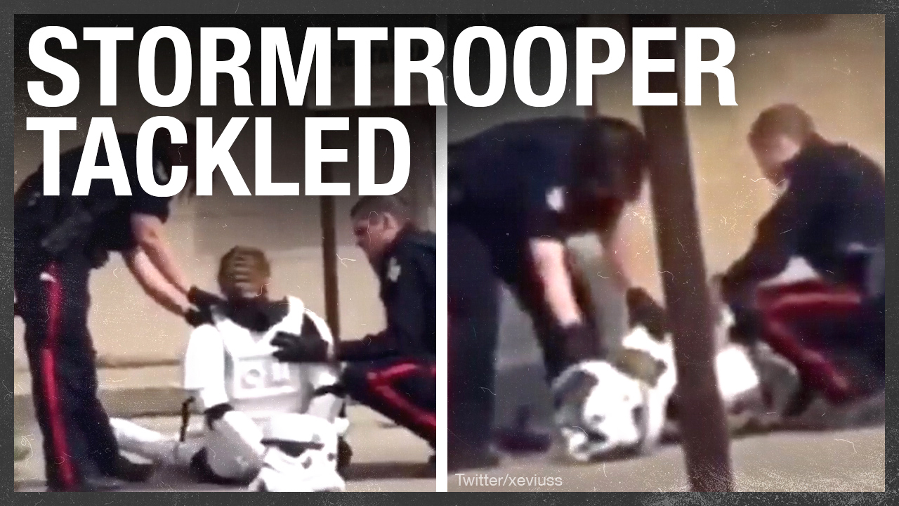 Stormtrooper arrested: Armed police pin cosplayer to ground, threaten ...